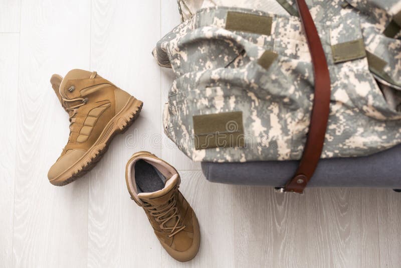 Military Camouflage Uniforms and Boots Stock Photo - Image of clothe ...