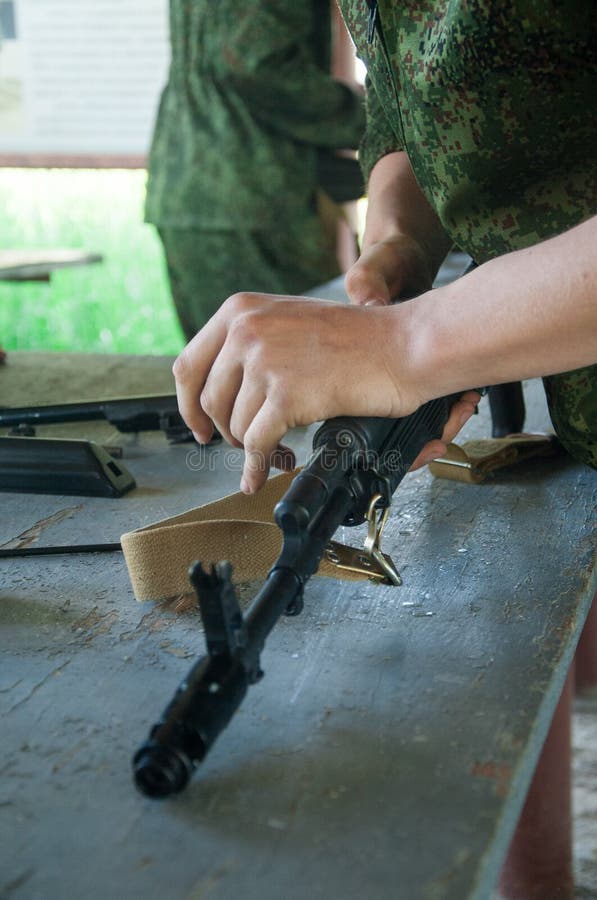 Military Camp. Assembling an Automatic Gun Stock Image - Image of ...