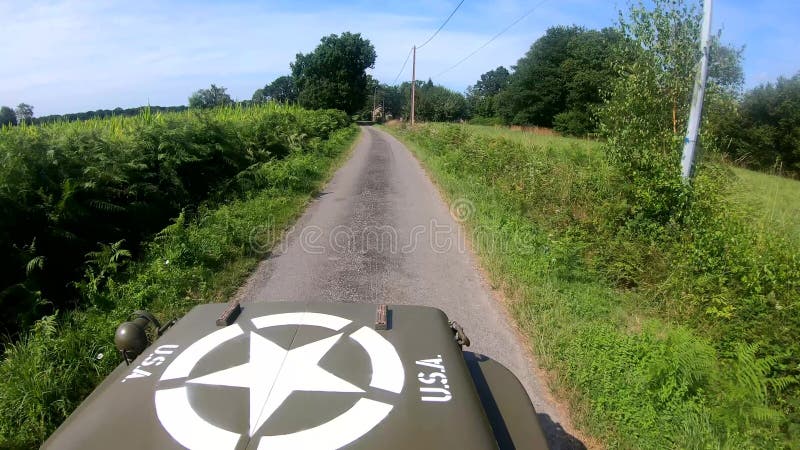 Military 4X4 Car Driving on Small Road Stock Video - Video of green ...