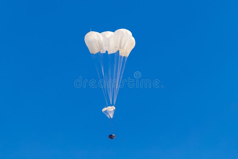 Military Cargo Parachute Flying in the Sky. Stock Image - Image of ...