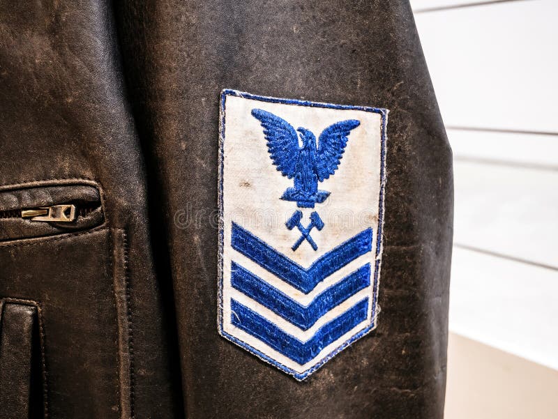 Military Chevron Patch on Leather Jacket Stock Photo - Image of ...
