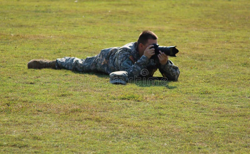 Military Crouching On Green Grass Using Dslr Camera During Daytime ...