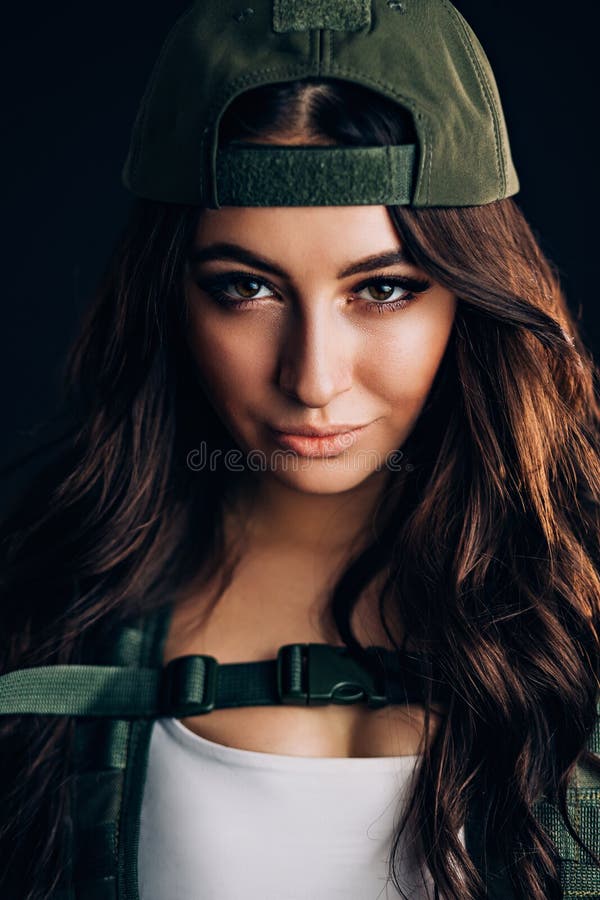 Military Fashion Close Up Portrait Of Beautiful Brunette Woman Looking
