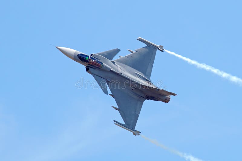 Military Fighter Jet on Blue Sky Stock Photo - Image of plane, airborne ...