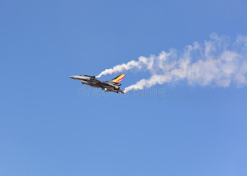 A Military Fighter Jet is Flying in the Blue Sky Stock Photo - Image of ...
