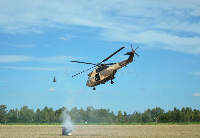 Helicopter shooting flares stock photo. Image of cloud - 44639936
