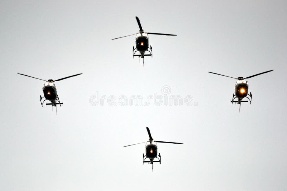 Military Helicopters - Formation Stock Image - Image of armed, military ...