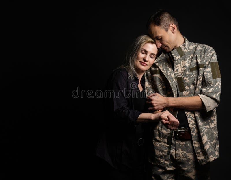 Military Man and His Wife on a Black Background Stock Photo - Image of ...