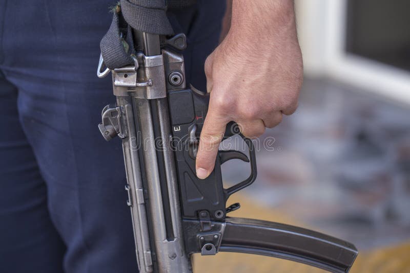Military Man Holds a Machine Gun in His Hand Stock Image - Image of ...