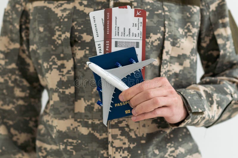 Military Man Holds Passports and Tickets. Stock Image - Image of ...