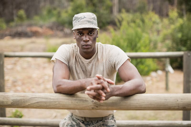 Military Man Standing during Obstacle Course in Boot Camp Stock Photo ...