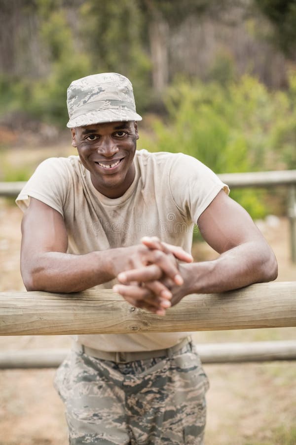 Military Man Standing with Arms Crossed during Obstacle Course in Boot ...