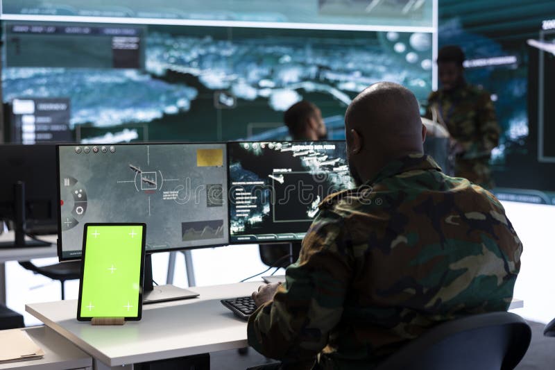 Military Man Works in Command Post Working on Collecting Real Time Data ...