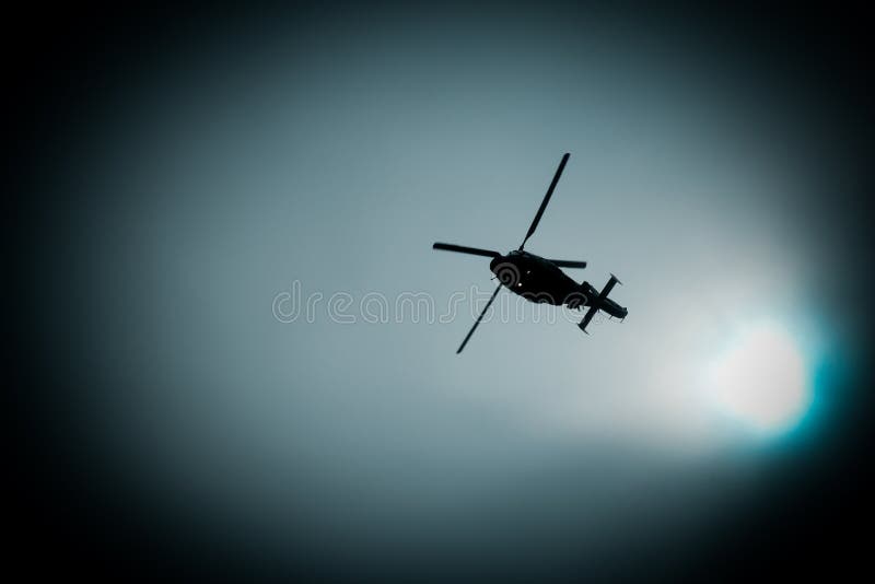 Military Navy Helicopter Flying in the Dark Sky Stock Photo - Image of ...