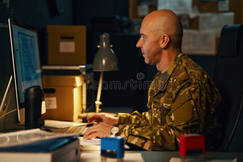 Military Officer Reviewing Documents Computer Stock Photos - Free ...