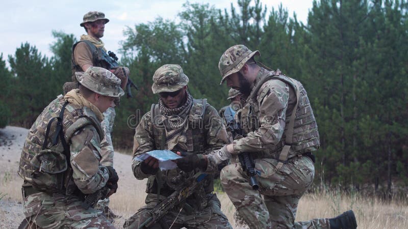 Military People Navigating on Battlefield Stock Photo - Image of ...