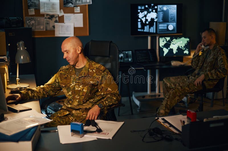 Analyzing Data in Military Command Center Setting Stock Image - Image ...