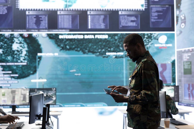 Military Personnel in a Base of Operations Using Advanced Computers ...
