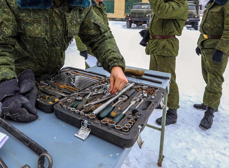 Military Personnel Organize Various Tools during Winter Training ...