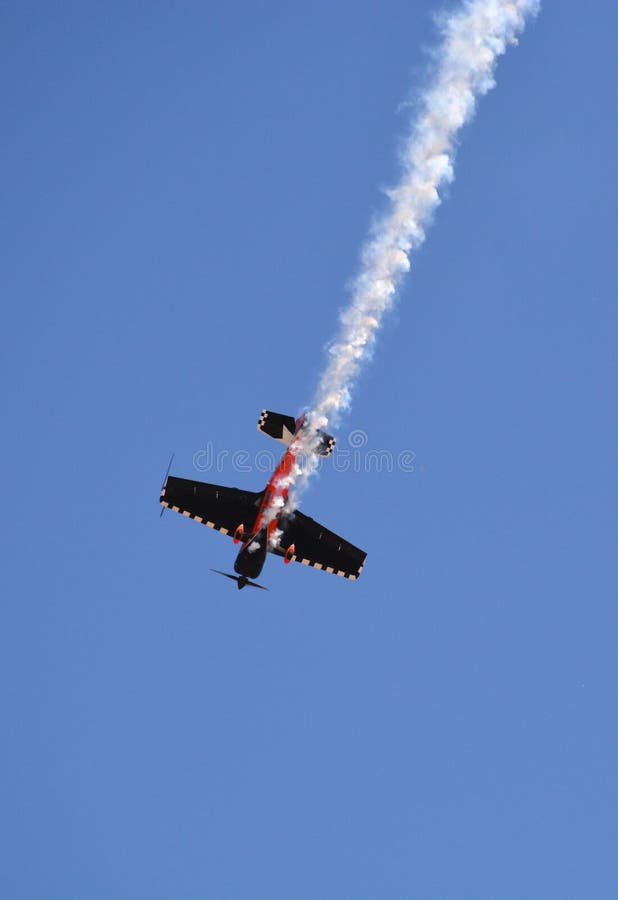 Military Plane Fly in with Smoke in the Blue Sky Stock Photo - Image of ...