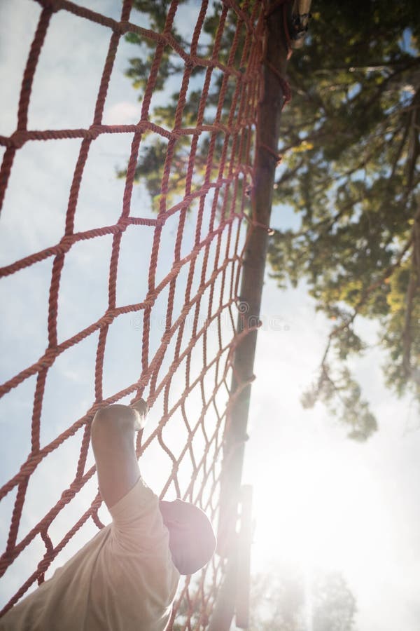 Military Soldier Climbing Rope during Obstacle Course Stock Image ...
