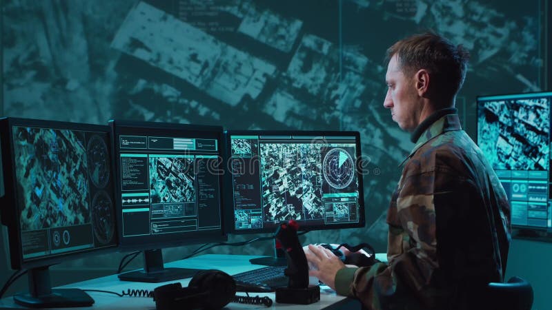 Military Soldier Operating Advanced Technology in a Command Center ...