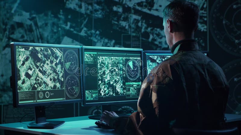 Military Soldier Operating Advanced Technology in a Command Center ...