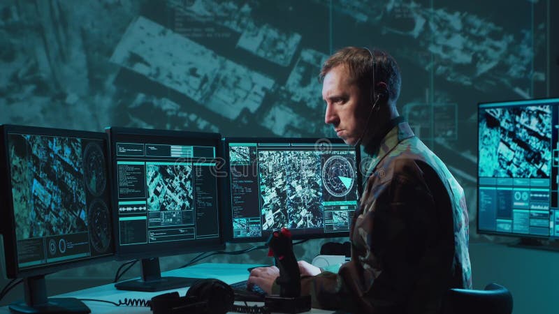 Military Soldier Operating Advanced Technology in a Command Center ...