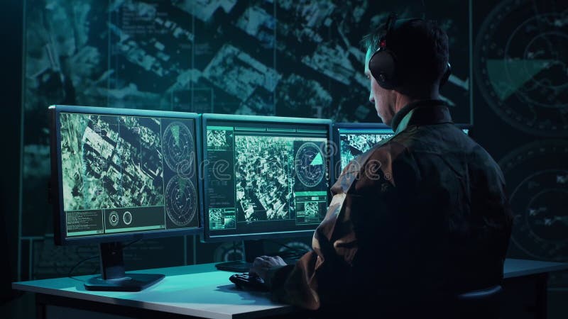 Military Soldier Operating Advanced Technology in a Command Center ...
