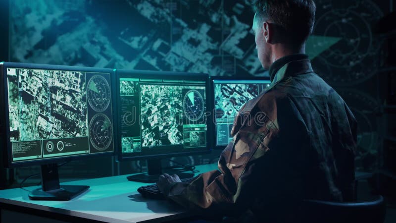 Military Soldier Operating Advanced Technology in a Command Center ...