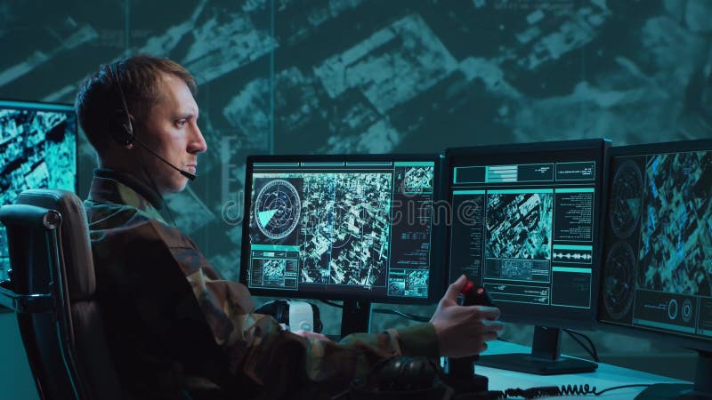 Military Soldier Operating Advanced Technology in a Command Center ...