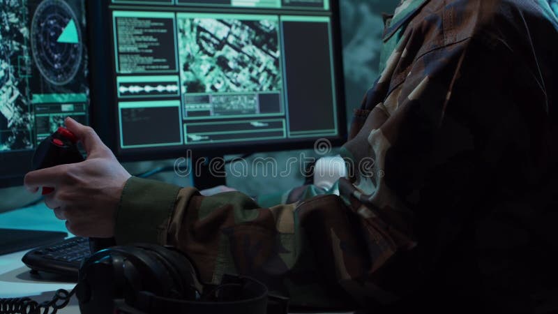 Military Soldier Operating Advanced Technology in a Command Center ...