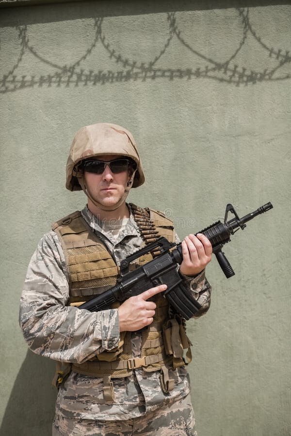 Military Soldier Standing with a Rifle Stock Image - Image of eyewear ...