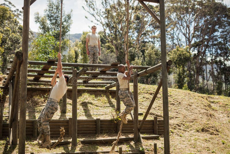 Military Soldiers Training Rope Climbing Stock Photo - Image of effort ...