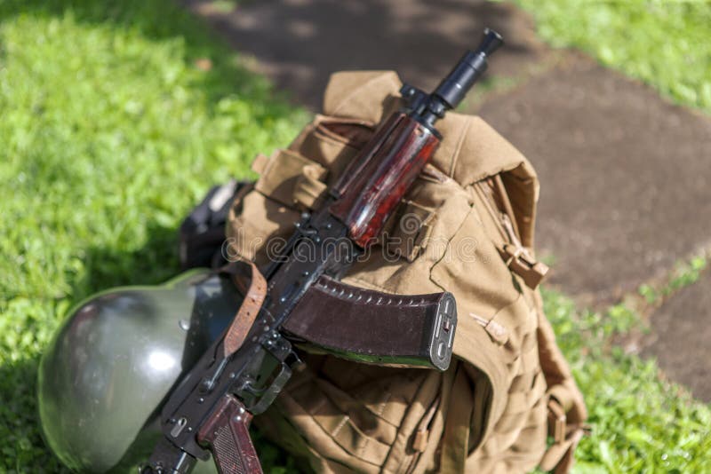 Military stuff on the lawn stock image. Image of helmet - 264051249