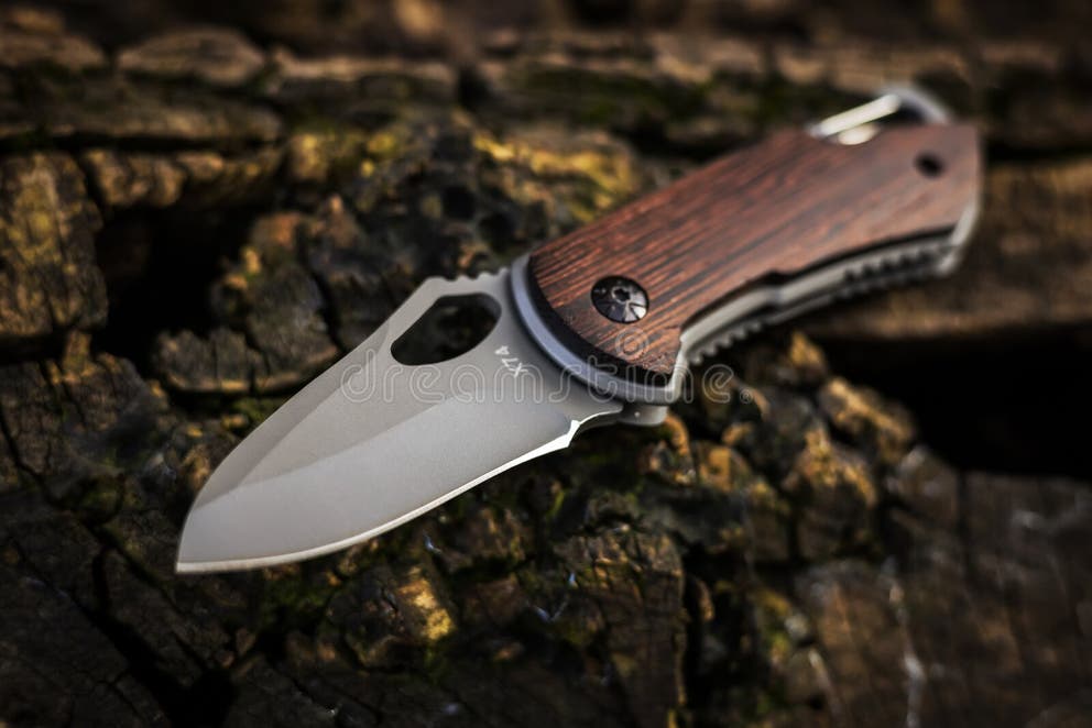 Military Tactical Knife on Tree in the Forest Stock Photo - Image of ...