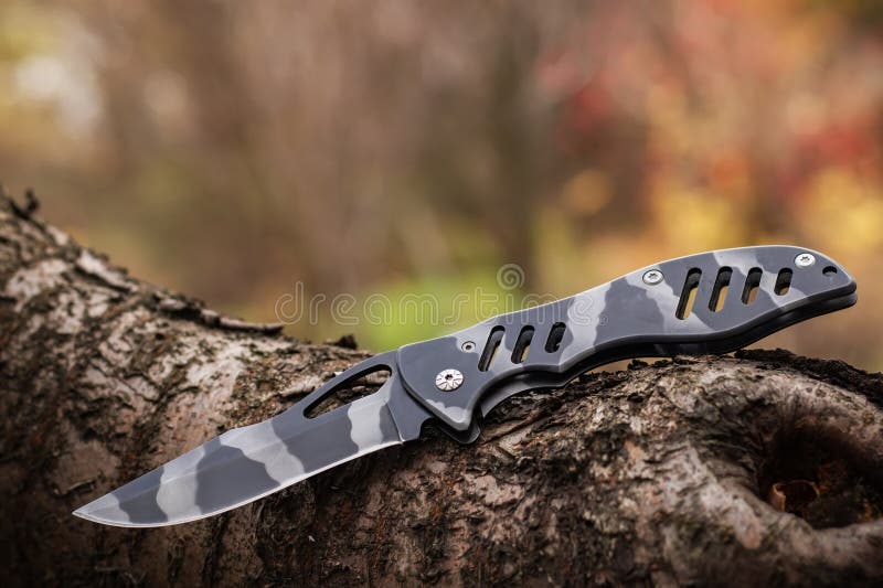 Military Tactical Knife on Tree in the Forest Stock Photo - Image of ...