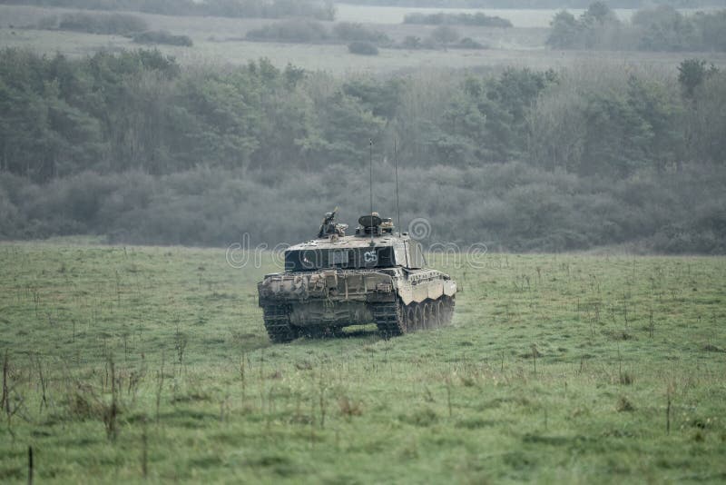 Military Tanks Moving in a Field Stock Photo - Image of heavy, nature ...