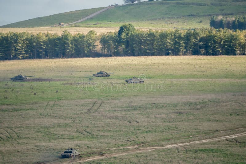 Military Tanks Moving in a Field Stock Image - Image of machine ...