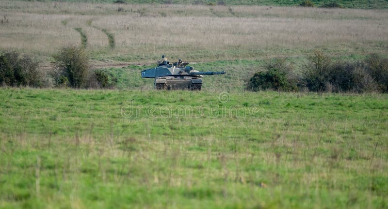 Military Tanks Moving in a Field Stock Photo - Image of army, weapon ...