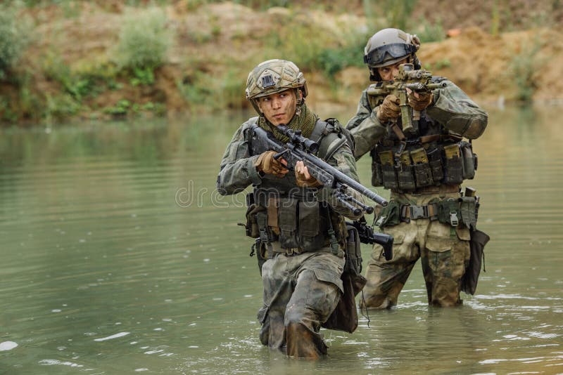 Military Team Crossing the River Under Fire Stock Photo - Image of ...