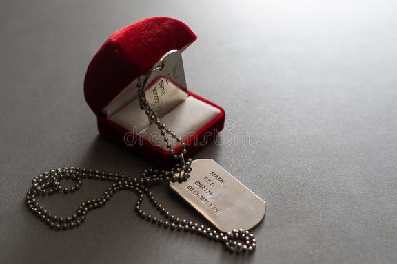 Military Token in a Wedding Ring Box Stock Image - Image of necklace ...