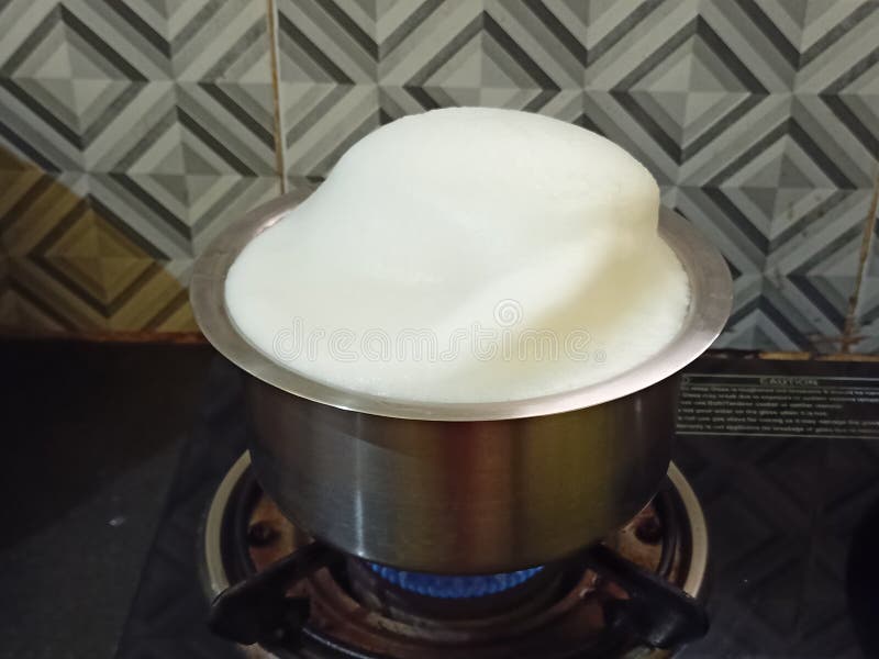 Milk is Being Boiling by Burning Gas. Kolkata Stock Photo - Image of ...