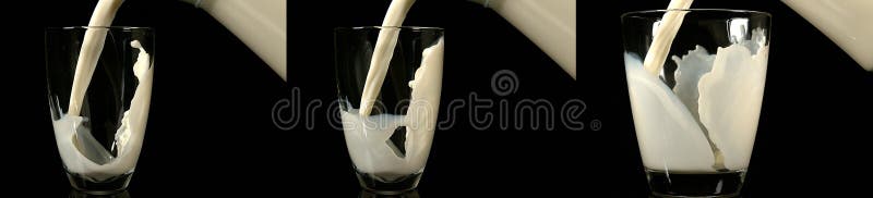 Milk Being Poured into Glass Against Black Background Stock Photo ...