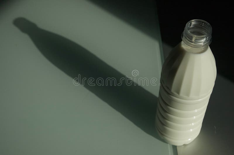 MIlk bottle stock photo. Image of shadow, milk, simple - 93298042