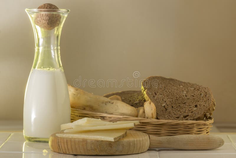 Milk, Cheese and Rolls in Wicker Basket Stock Photo - Image of cereal ...