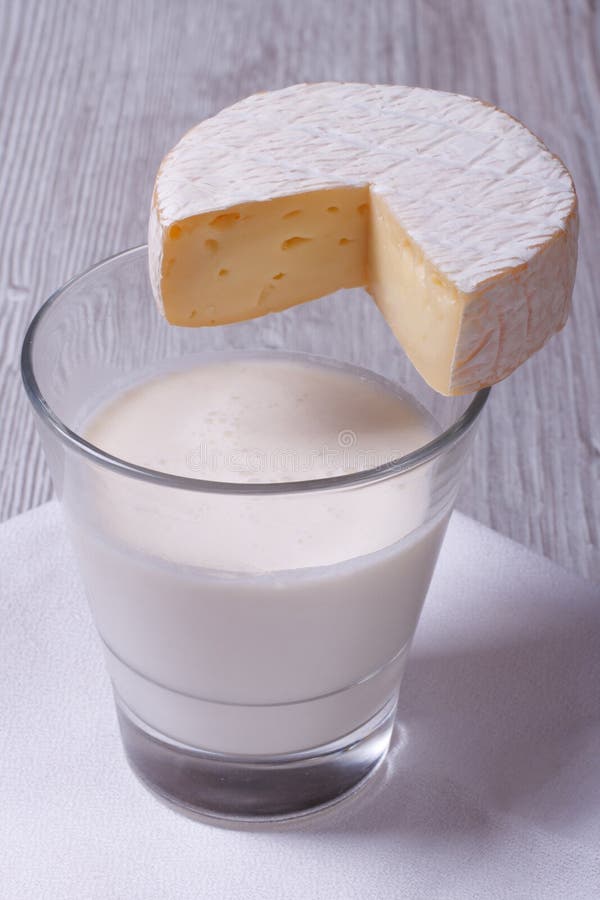 Milk and Brie Cheese Close Up Stock Image - Image of board, food: 37123173