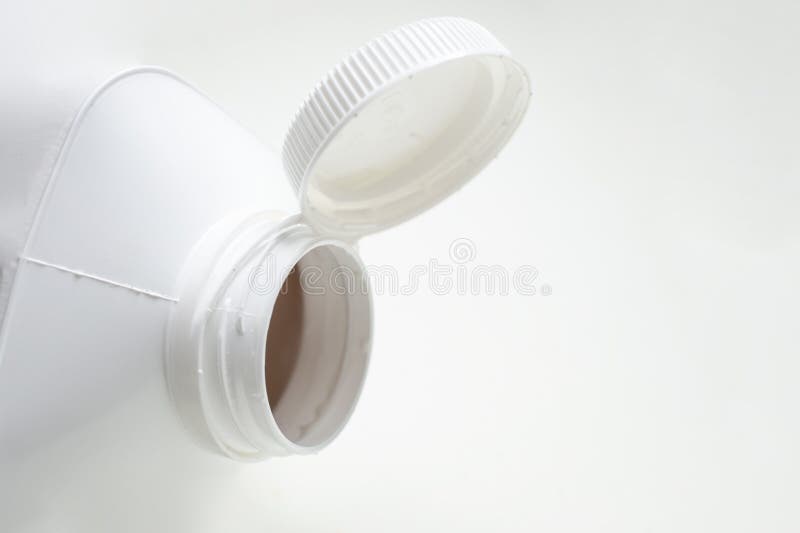 Milk Carton Box with Tethered Plastic Cap, Close Up on White Background ...