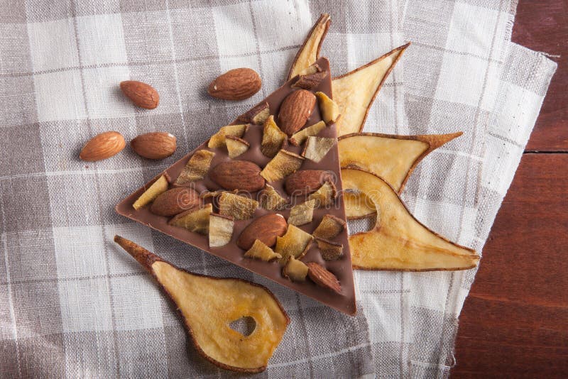 Milk Chocolate with Pear and Almonds Stock Image - Image of delicious ...