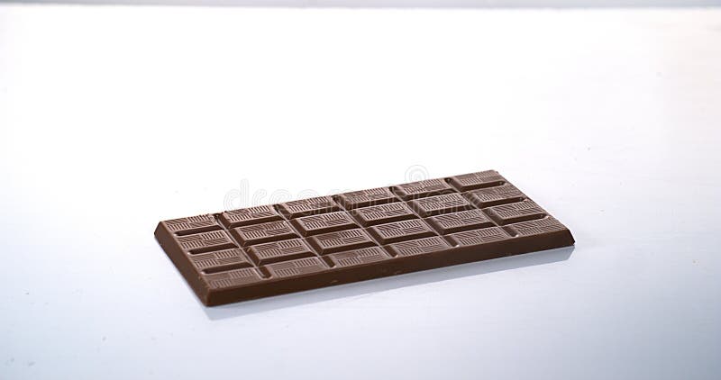 Milk Chocolate tablet stock image. Image of movement - 289193185